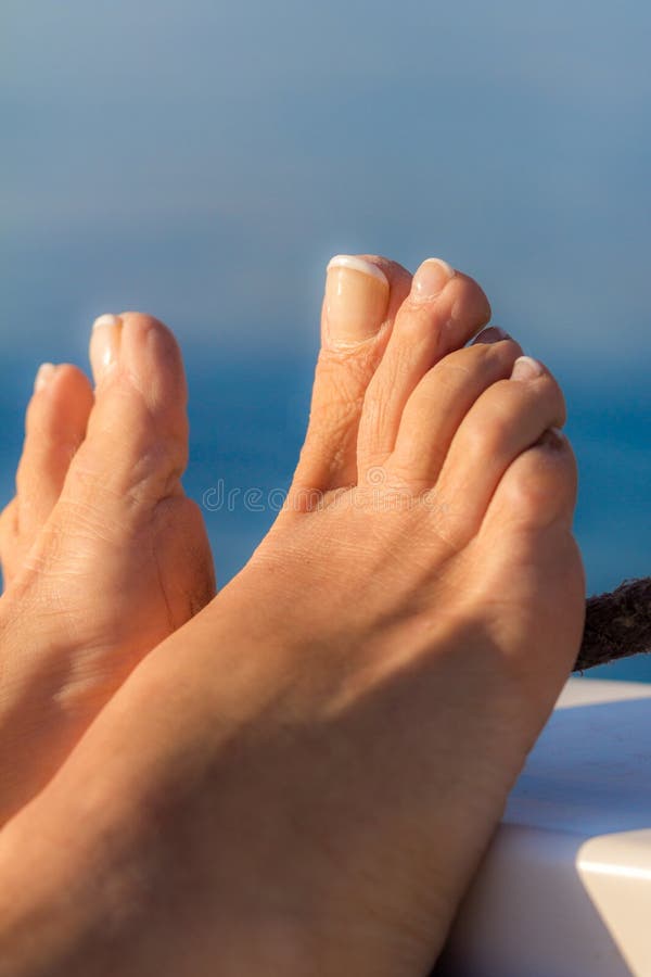 Feet on a boat stock image. Image of beautiful, parachute - 64548907