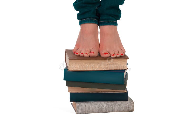 Feet on the books stock photo. Image of teenager, cute - 70480584
