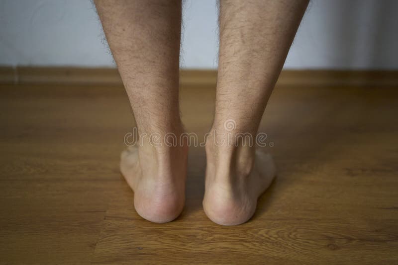 The Feet and Calves of a Man from Behind Stock Photo - Image of ...