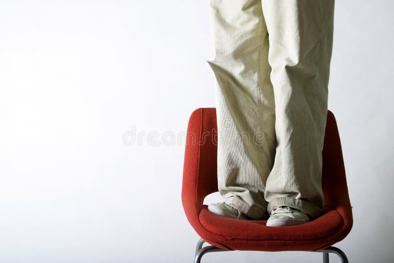 Feet on a Chair stock photo. Image of pants, stretch, male - 288256