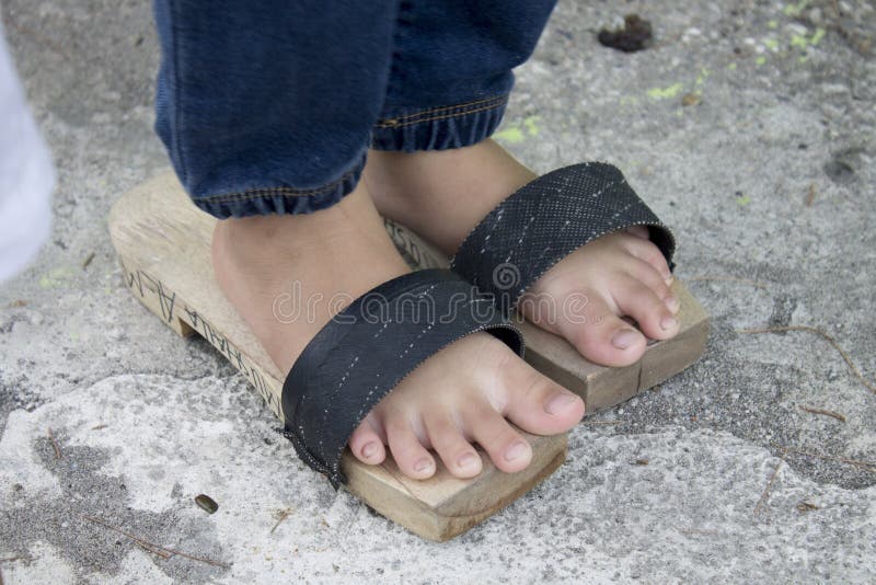 The Feet of the Children are Wearing Tanglek Stock Image - Image of ...