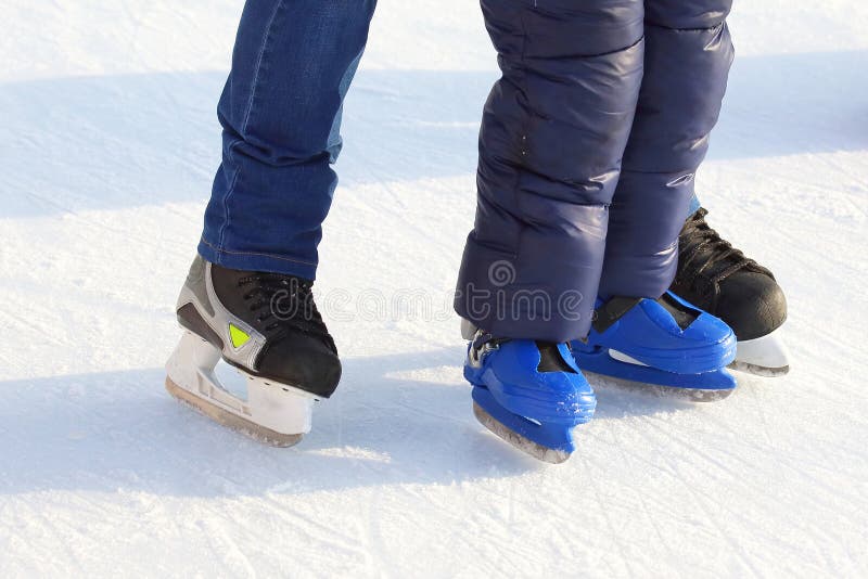 Feet of Different People Skating on the Ice Rink Stock Image - Image of ...