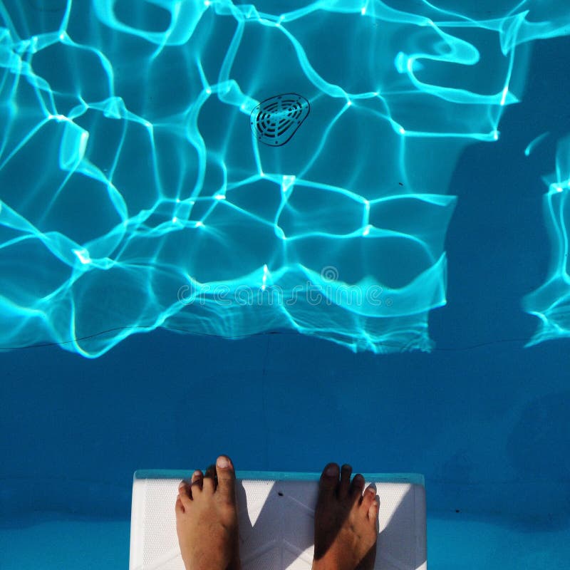 Feet on diving board stock image. Image of pool, board - 49477843