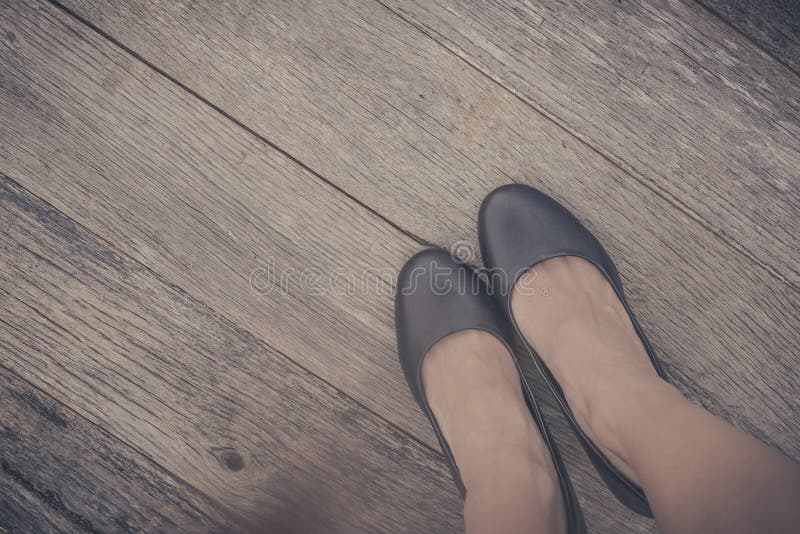 Feet. First-Person View on Rustic Wood Background. Stock Image - Image ...