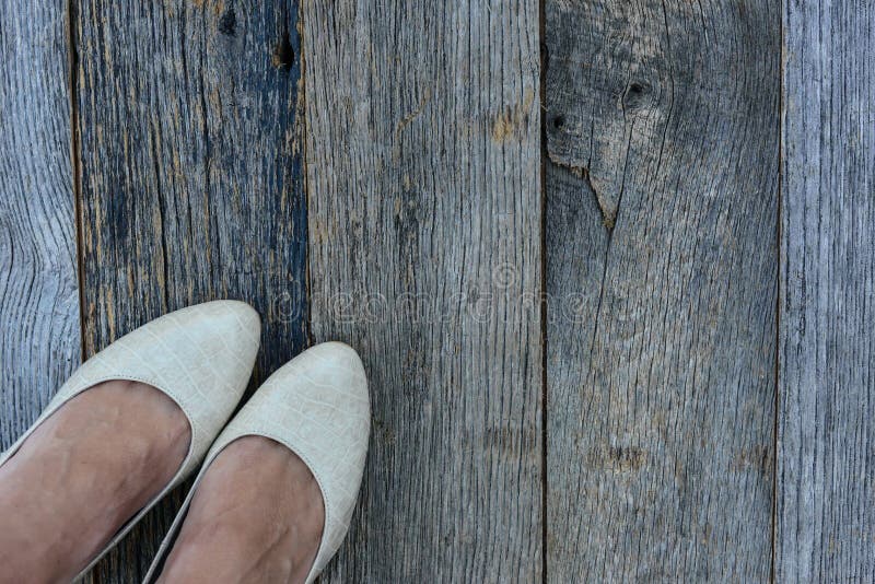 Feet. First-Person View on Rustic Wood Background. Stock Image - Image ...
