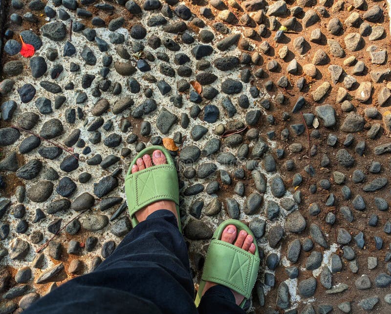 Feet in Green Sandals Walking on the Path Stock Photo - Image of ...