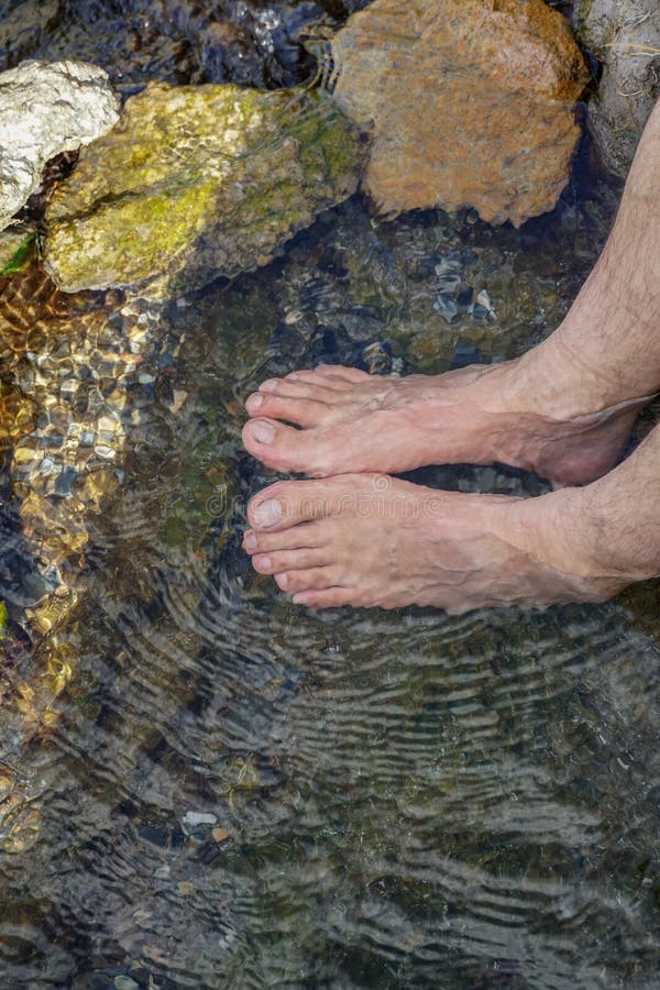Feet Immersed in the Clear Water of a River Stock Photo - Image of ...