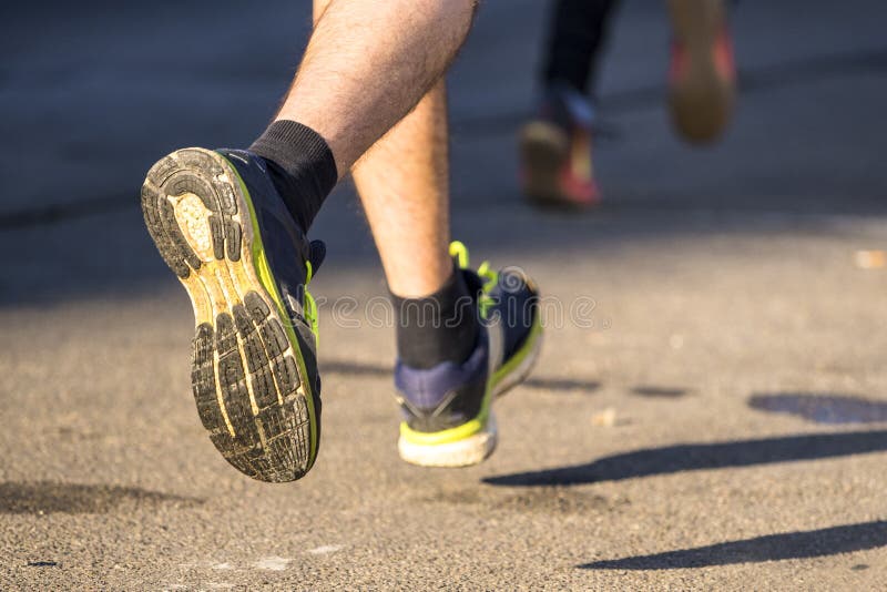 Feet of a jogger stock image. Image of athletic, outdoor - 83733317