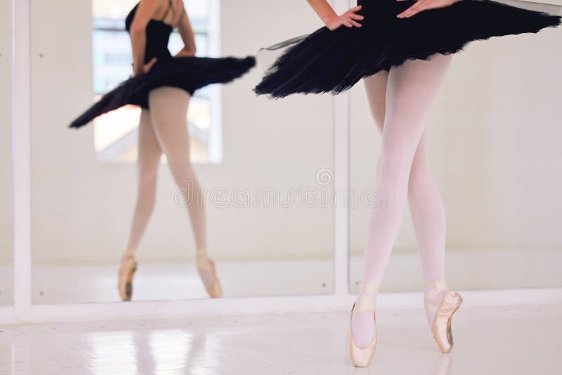 Feet and Legs of Ballet Dancer Dancing in a Studio, Practicing Dance in ...