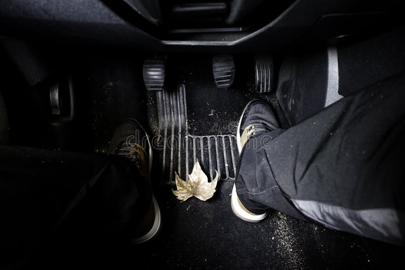 Feet of man driving stock photo. Image of control, shoes - 248820534