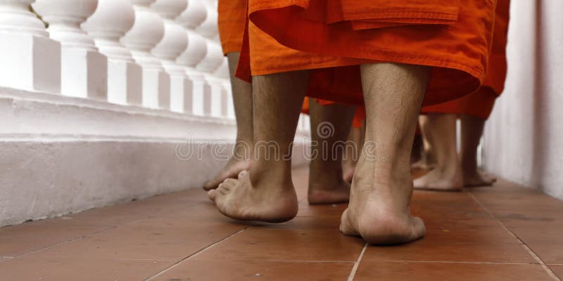 Feet of monks walking stock image. Image of buddhism - 100892099
