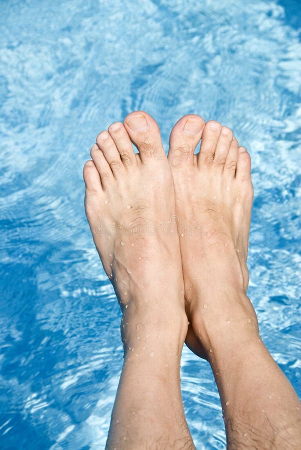Feet Over the Swimming Pool Stock Image - Image of toes, relaxation ...
