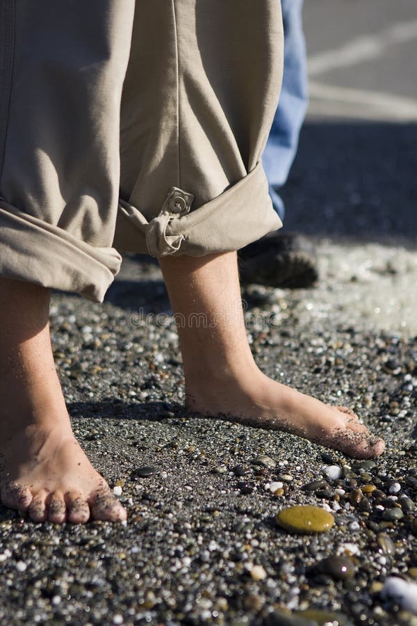 Feet on pebbles stock photo. Image of feet, summer, coastal - 12423964