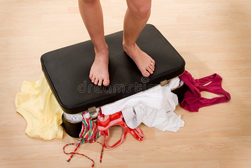 801 Overflowing Suitcase Stock Photos - Free & Royalty-Free Stock ...