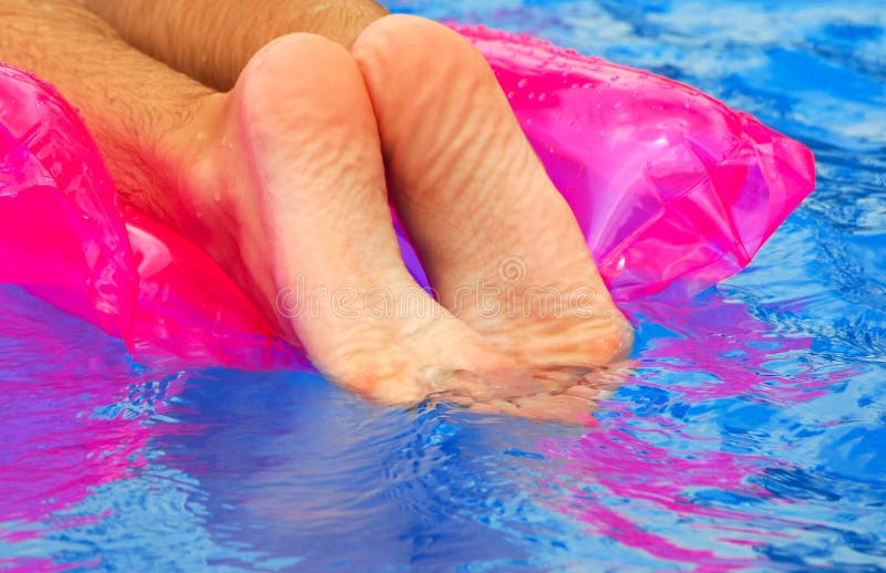 Feet in Pool stock image. Image of pink, cool, swimming - 6792347