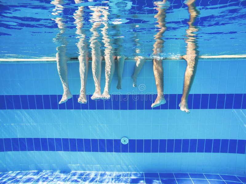Feet in the pool stock image. Image of healthy, family - 95193983