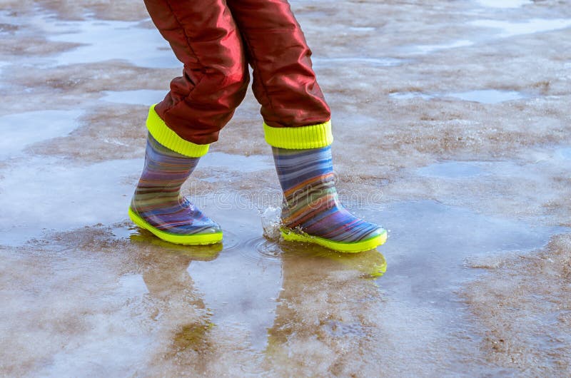 Feet in rubber boots stock image. Image of park, happy - 88686187
