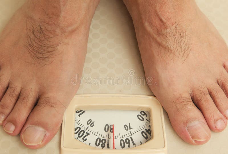 Feet on scale stock photo. Image of diet, measuring, body - 16922120