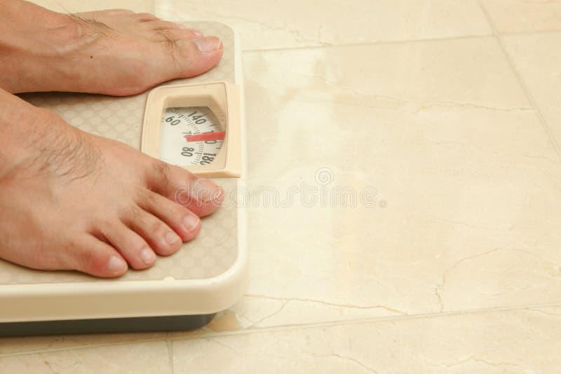 Feet on scale stock photo. Image of starve, size, slim - 17085540