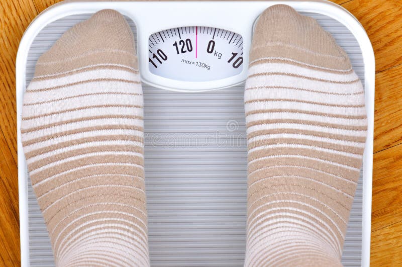 Feet on the scale stock photo. Image of balance, healthcare - 72048842