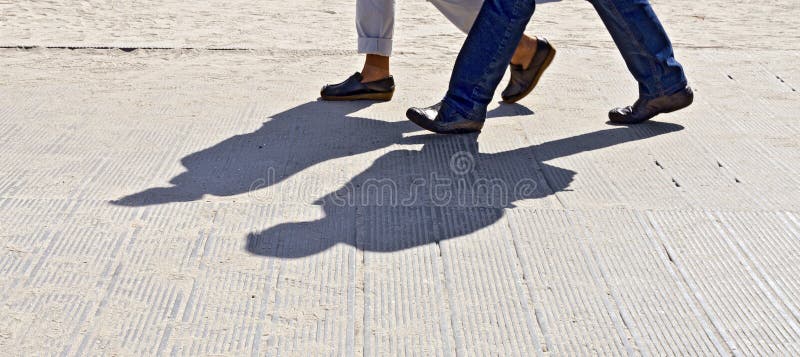 Feet and Shadow of Two Walkers Stock Image - Image of zingst, shadow ...