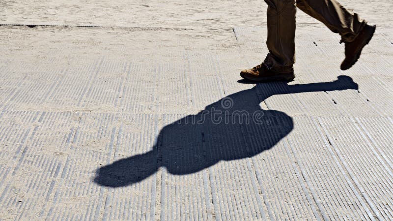 Feet and Shadow of a Walker Stock Image - Image of zingst, shoes: 56070465