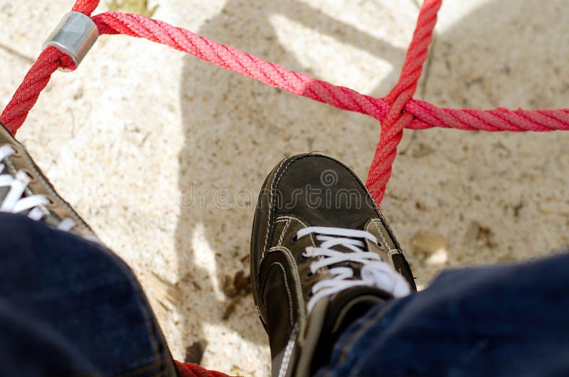 Feet with Shoe and Red Rope on Climbing Rope Scaffold Stock Photo ...