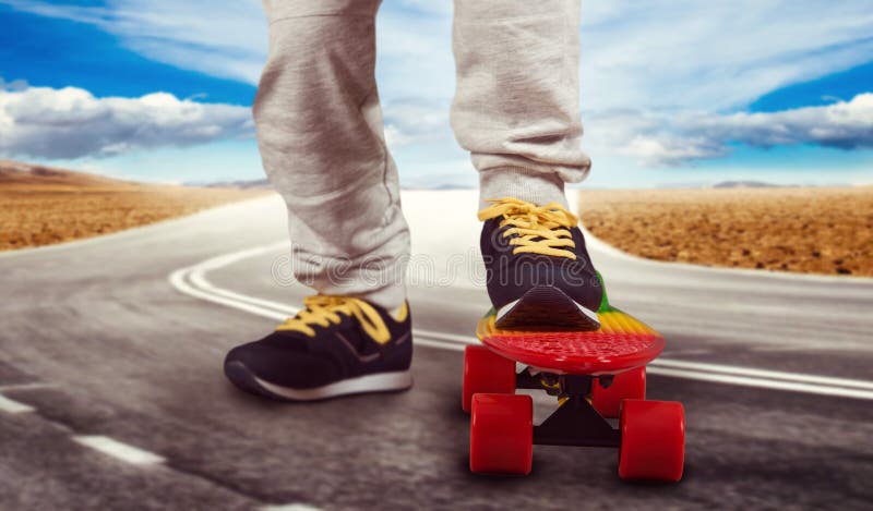 A Child Riding on a Skateboard.Feet on a Skateboard Closeup. Stock ...