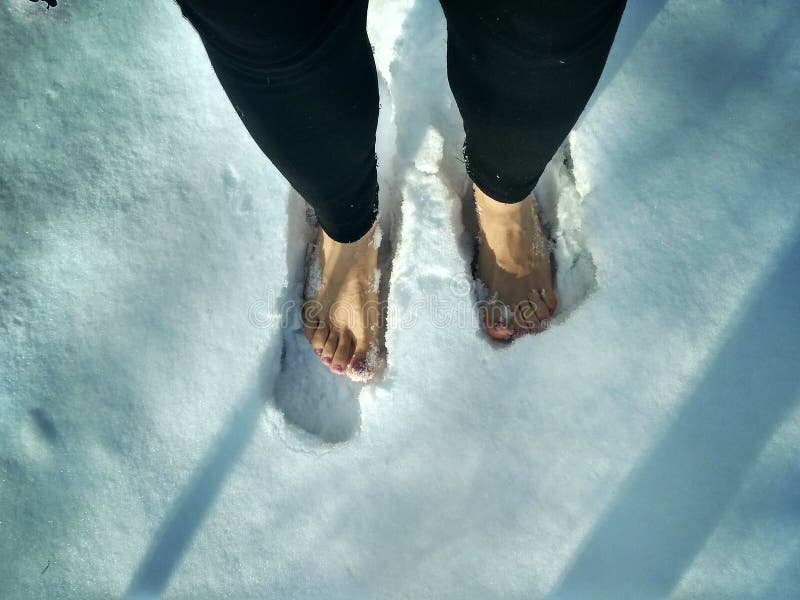 Feet on the snow editorial stock image. Image of standing - 94353869