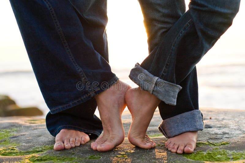 Feet at Sunset stock image. Image of foot, boulder, sunset - 9963267