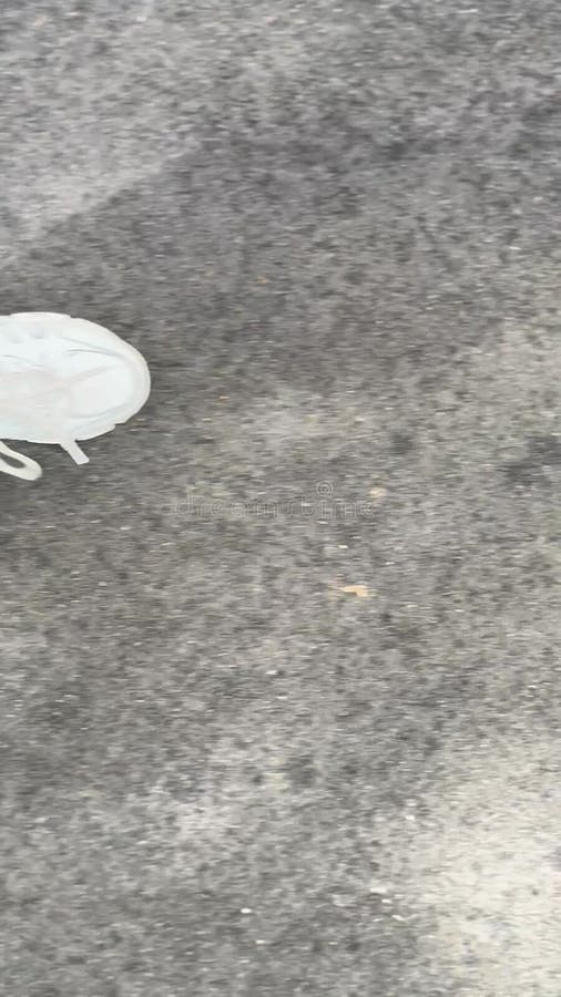 Gait on a wet road stock video. Video of humidity, shadows - 392957377