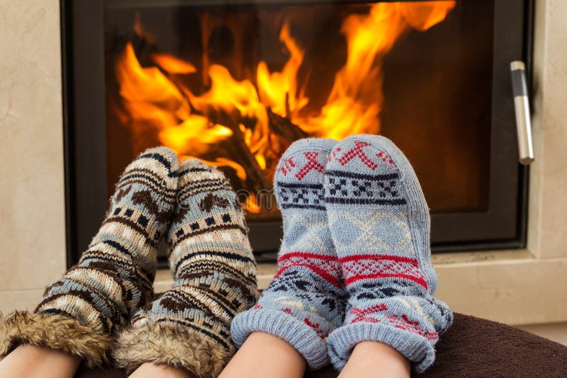 Feet Warming Fireplace Stock Photos - Download 446 Royalty Free Photos