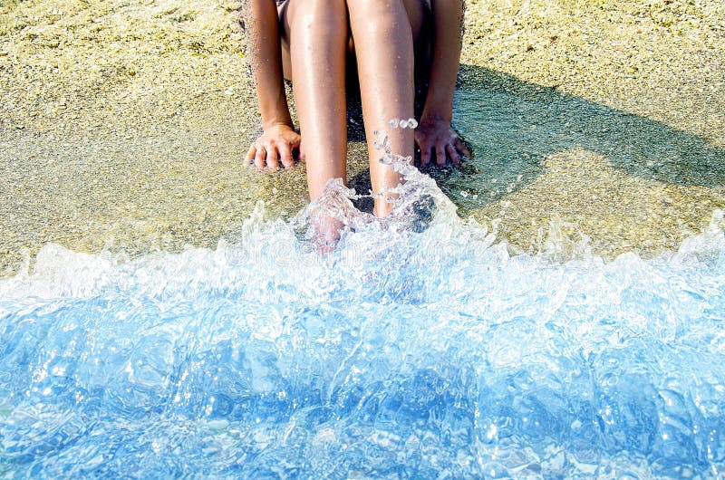 Feet washed in ocean wave stock photo. Image of barefoot - 32971280