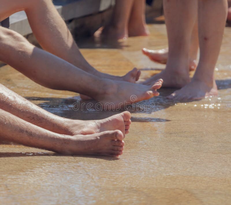 Feet in the Water in a Fountain Stock Photo - Image of beautiful ...