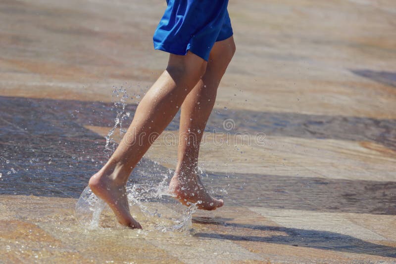 Feet in the Water in a Fountain Stock Photo - Image of background ...