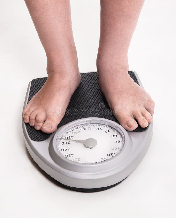 Feet on Weight Scale stock photo. Image of legs, wellbeing - 94825364