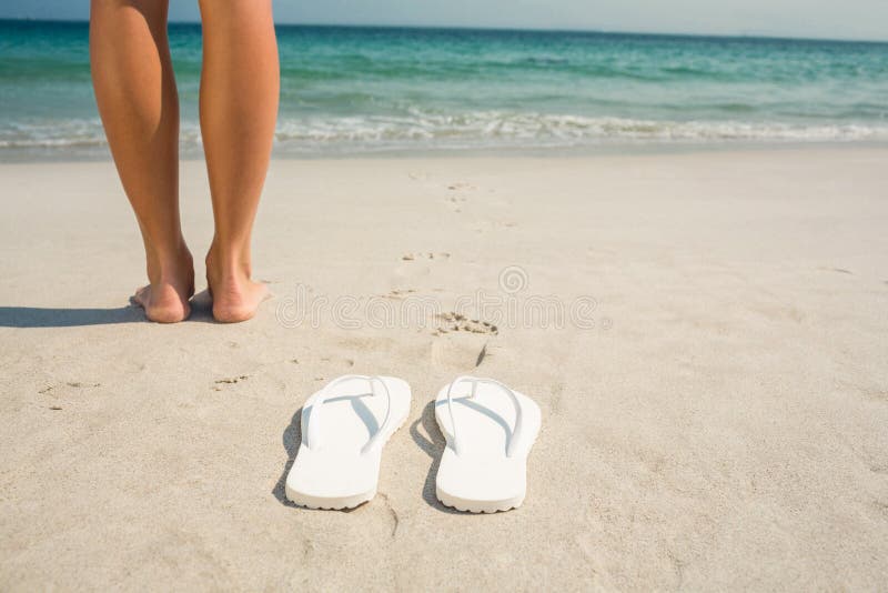 Feet of woman at the beach stock photo. Image of holidays - 54772134