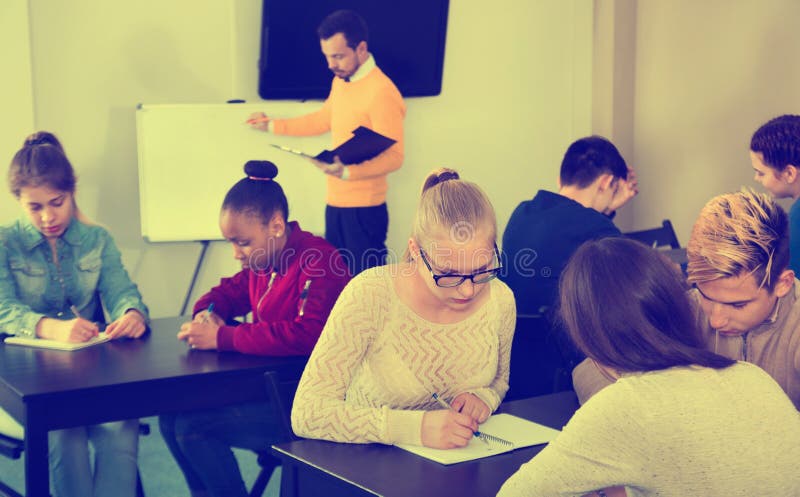 Fellow Students Having Group Work Tasks during School Day Stock Photo ...