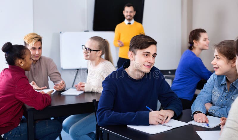 Fellow Students Having Group Work Tasks during School Day Stock Photo ...