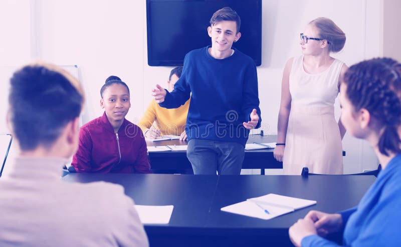 Fellow Students Talking in Class Stock Image - Image of college ...