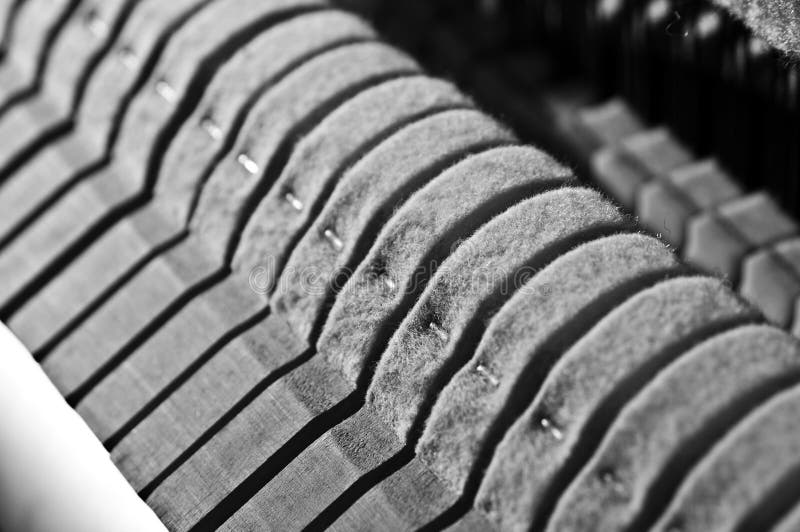 Felt piano hammers stock image. Image of percussion, rows - 99476271