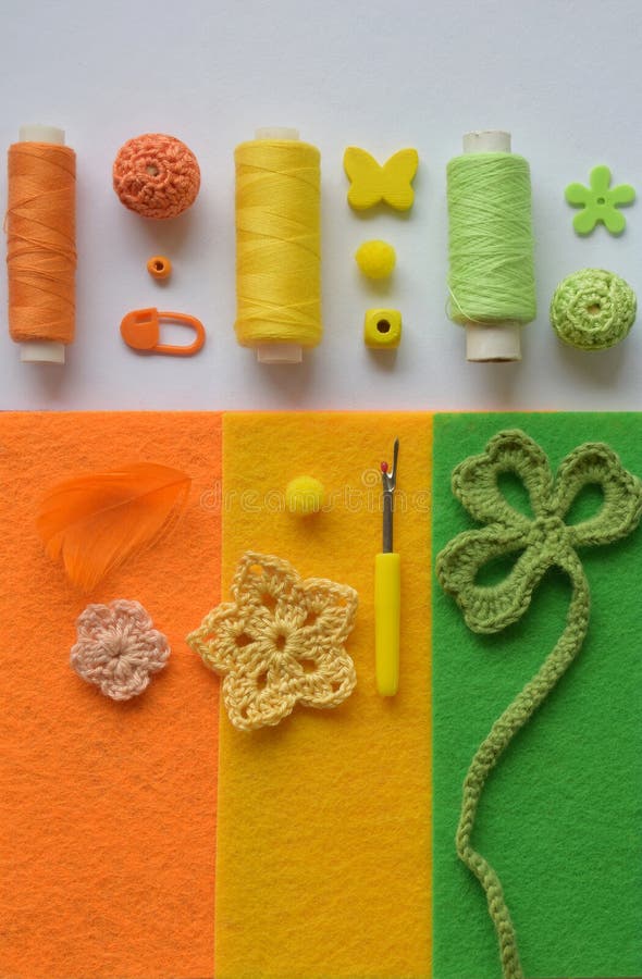 Felt Sections in Orange, Yellow and Green Arranged Under Yarn Elements ...