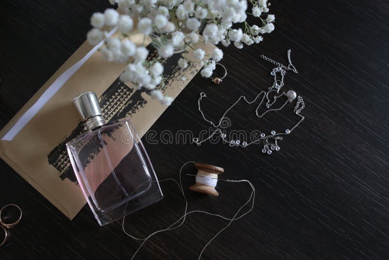 Female Accessories Perfume Jewels Flowers Table Stock Image - Image of ...