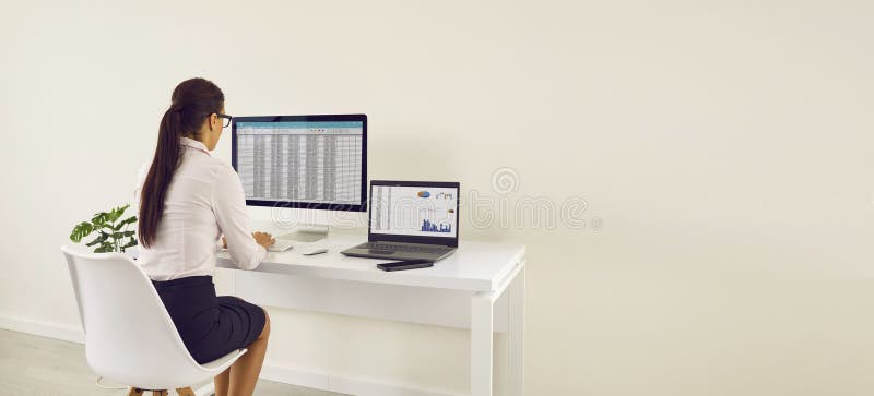 Female Accountant and Analyst Checking Spreadsheets on Computer and ...