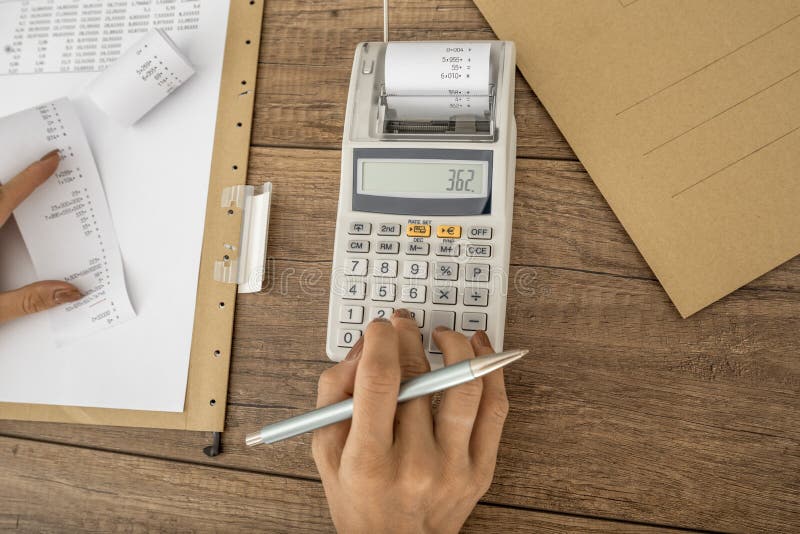 Female Accountant Using Adding Machine Stock Photo - Image of bill ...