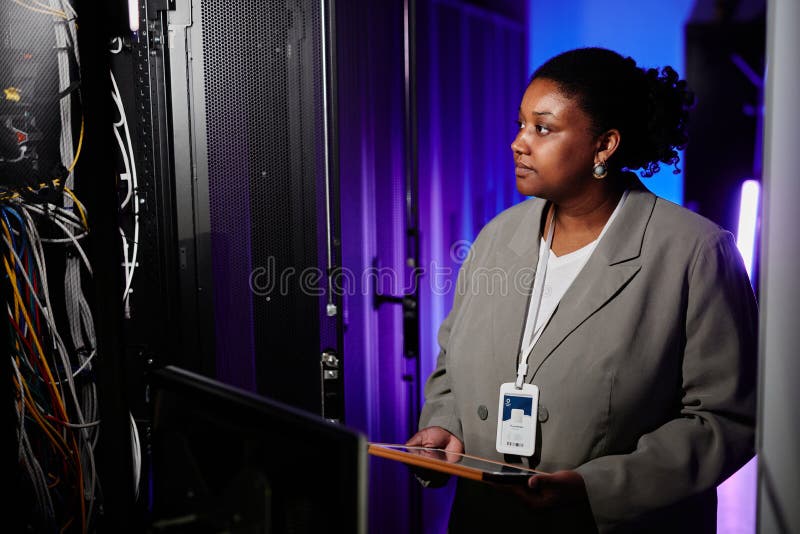 Female Admin Using Laptop in Server Room Stock Image - Image of ...