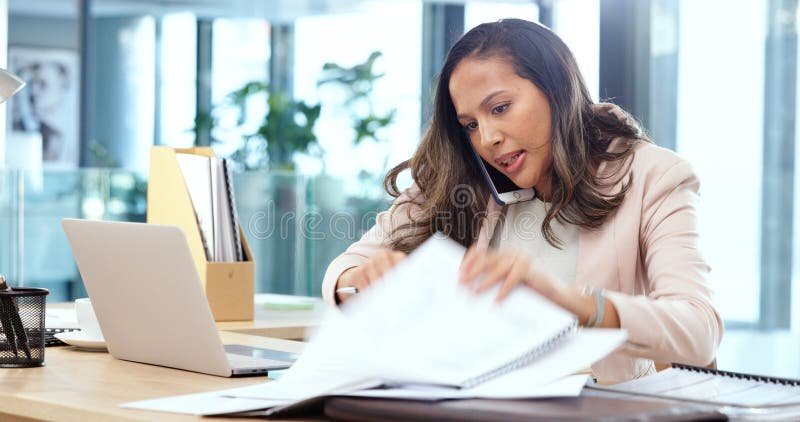 Female Advertising Agent Looking Busy while Talking on a Phone Call and ...
