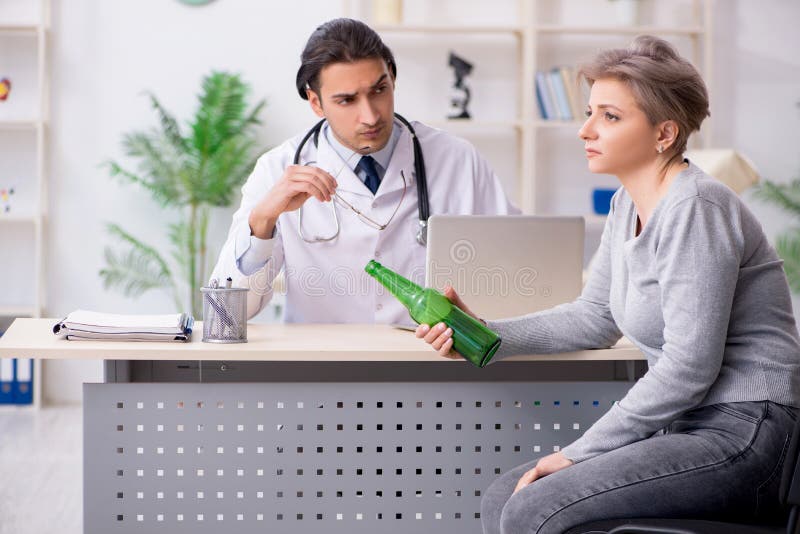 Female Alcoholic Visiting Young Male Doctor Stock Image - Image of ...