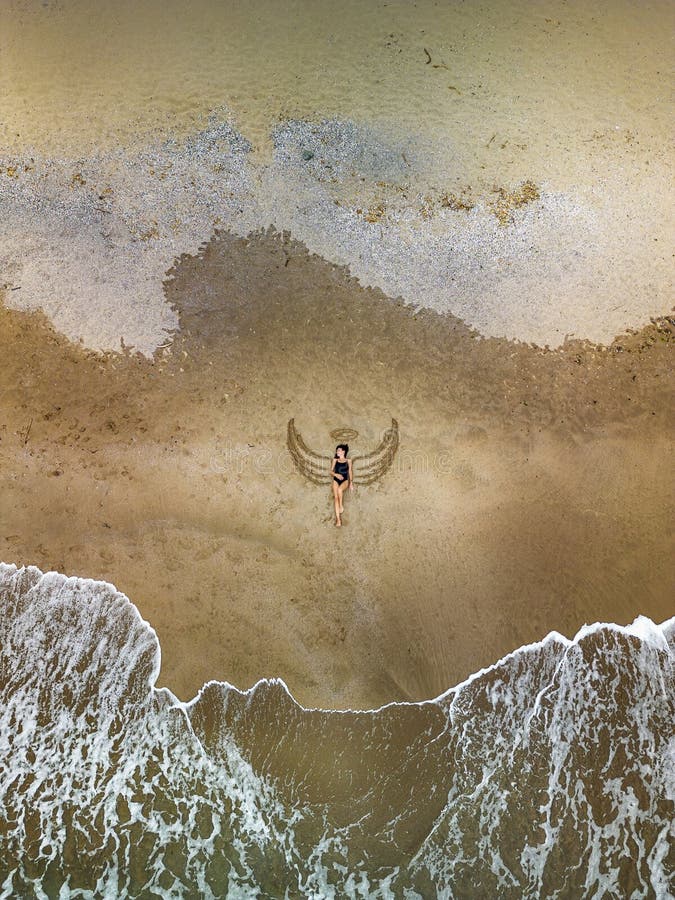Female Angel on the Beach, Drone Photo from Above Editorial Photography ...