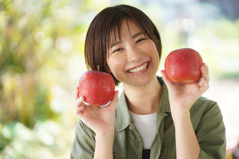 Female with an apple stock photo. Image of skin, adolescent - 238152800